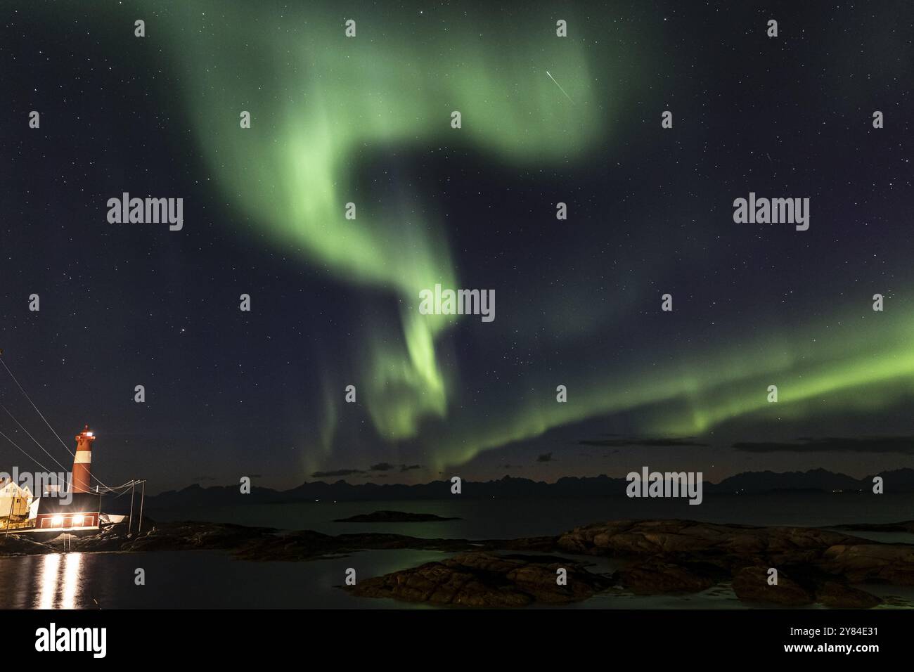 Aurora borealis about the lighthouse of tranoy hi-res stock photography ...
