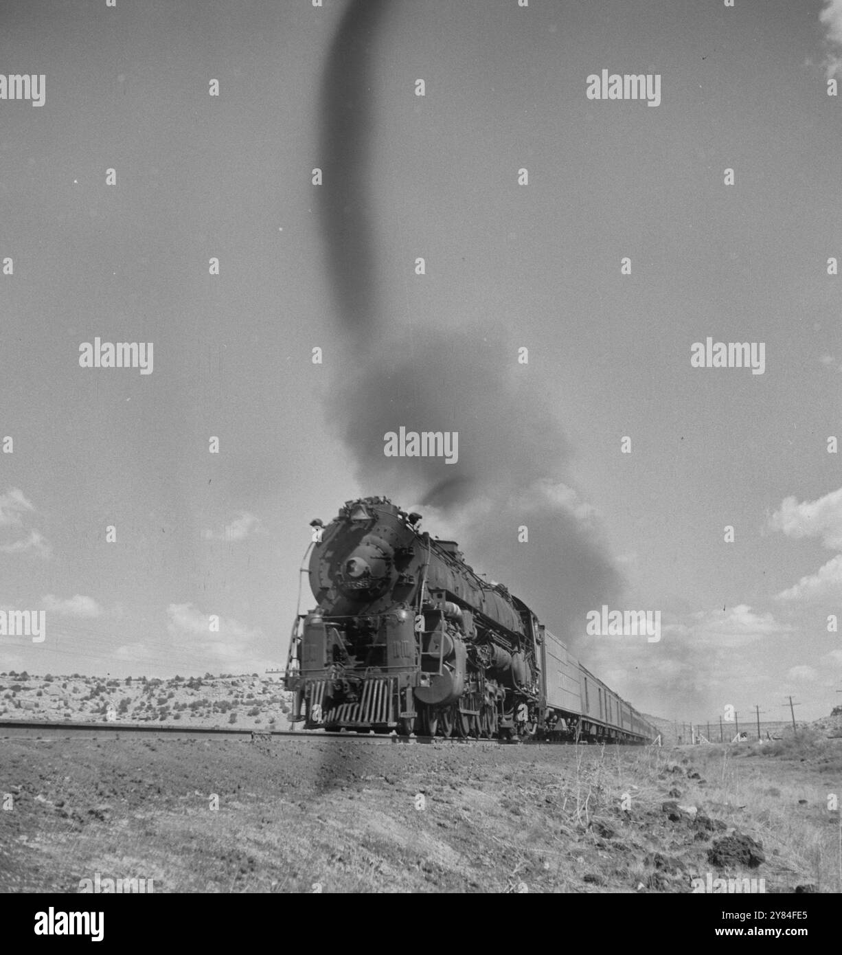 Acomita, New Mexico. A westbound passenger train passing on the ...