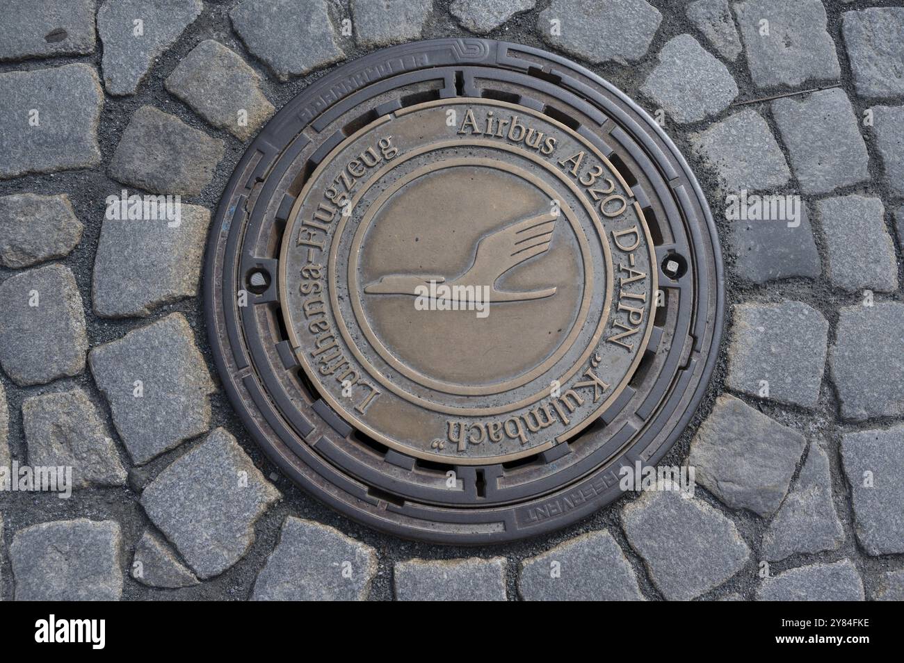 Municipal manhole cover with Lufthansa symbol, Kulmbach, Upper ...