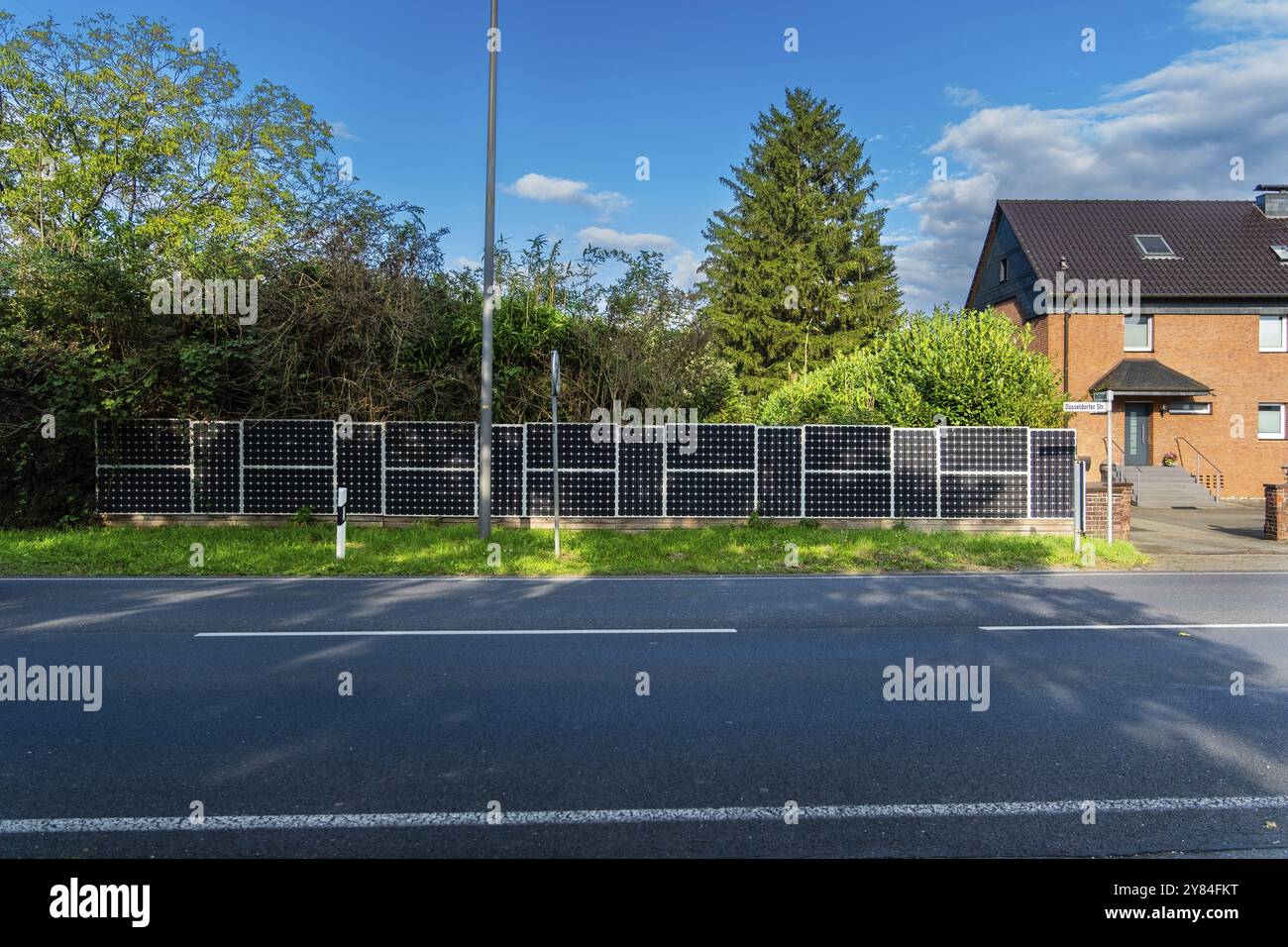 Solar fence, solar panels as a garden fence and privacy screen on a ...