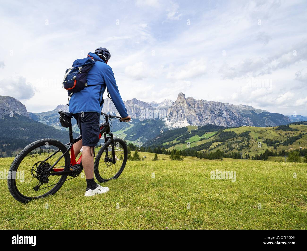 Cycling scene on the dolomites Stock Photo - Alamy