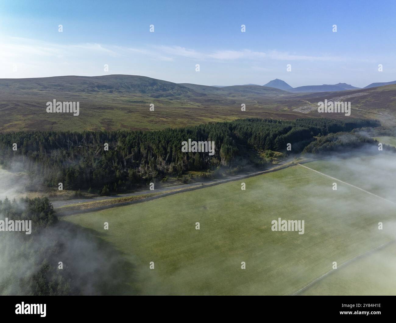 Coastal fog in the Scottish Highlands with hills, in the background ...