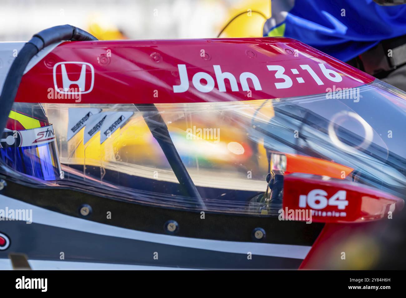 INDYCAR driver, STING RAY ROBB (R) (51) of Payette, Idaho, prepares to ...