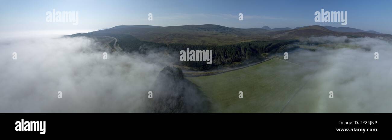 Coastal fog in the Scottish Highlands with hills, drone image, Broch of ...