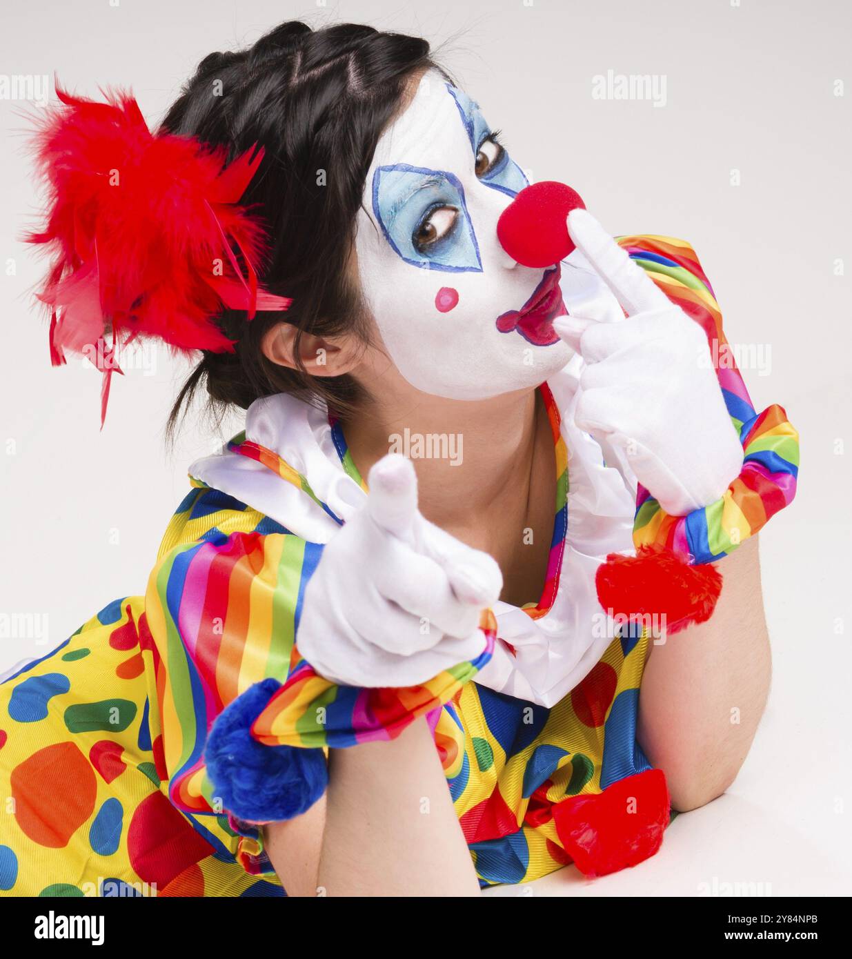 Colorful female clown actress speaking out Stock Photo - Alamy