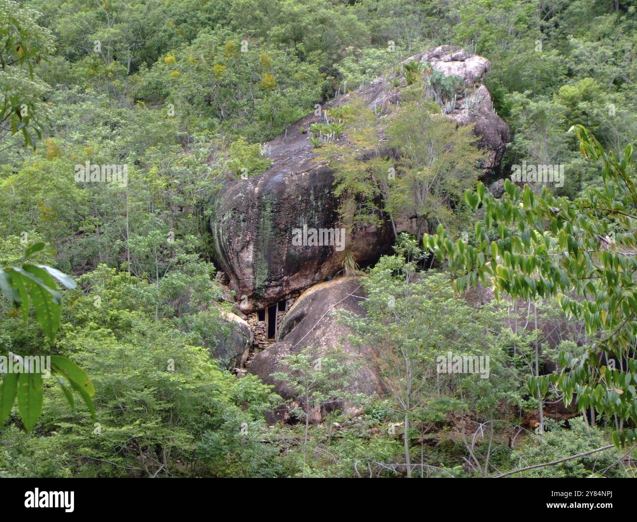 Flat under rock Stock Photo - Alamy