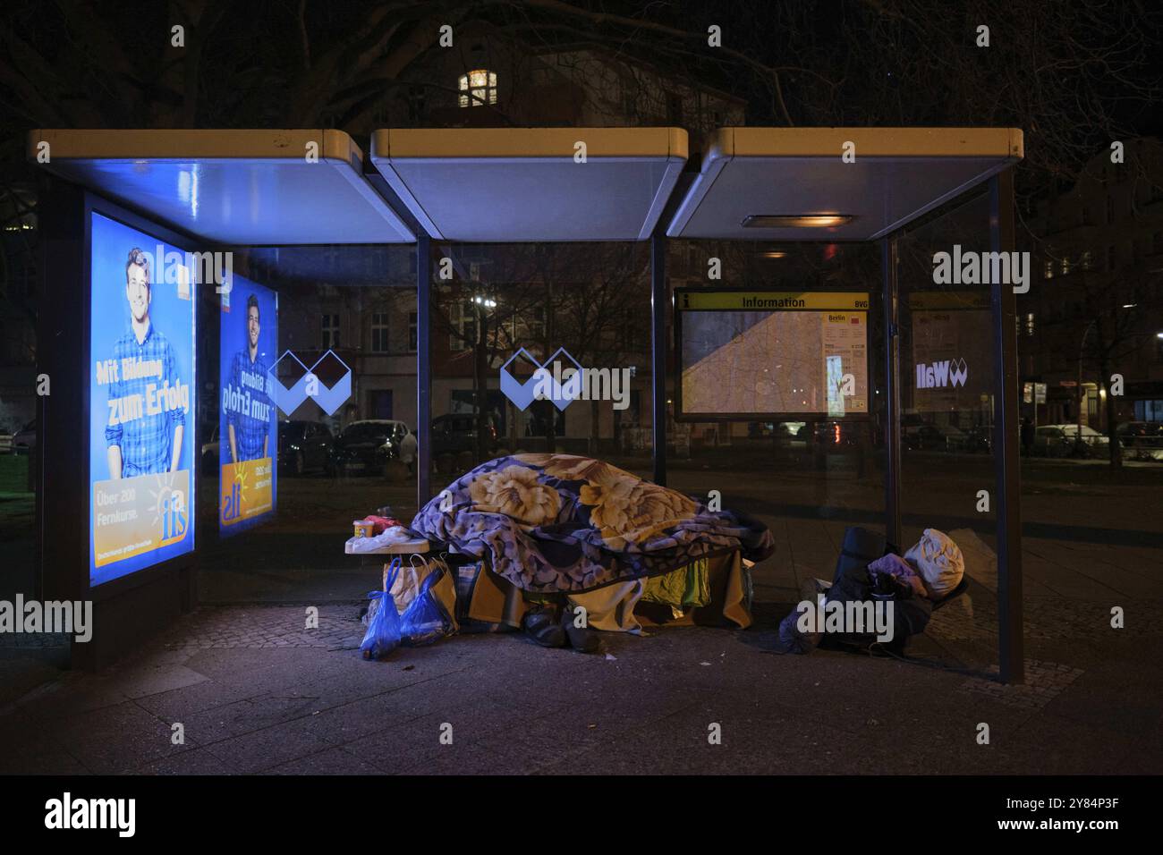 Homeless sleeping on bus hi-res stock photography and images - Alamy