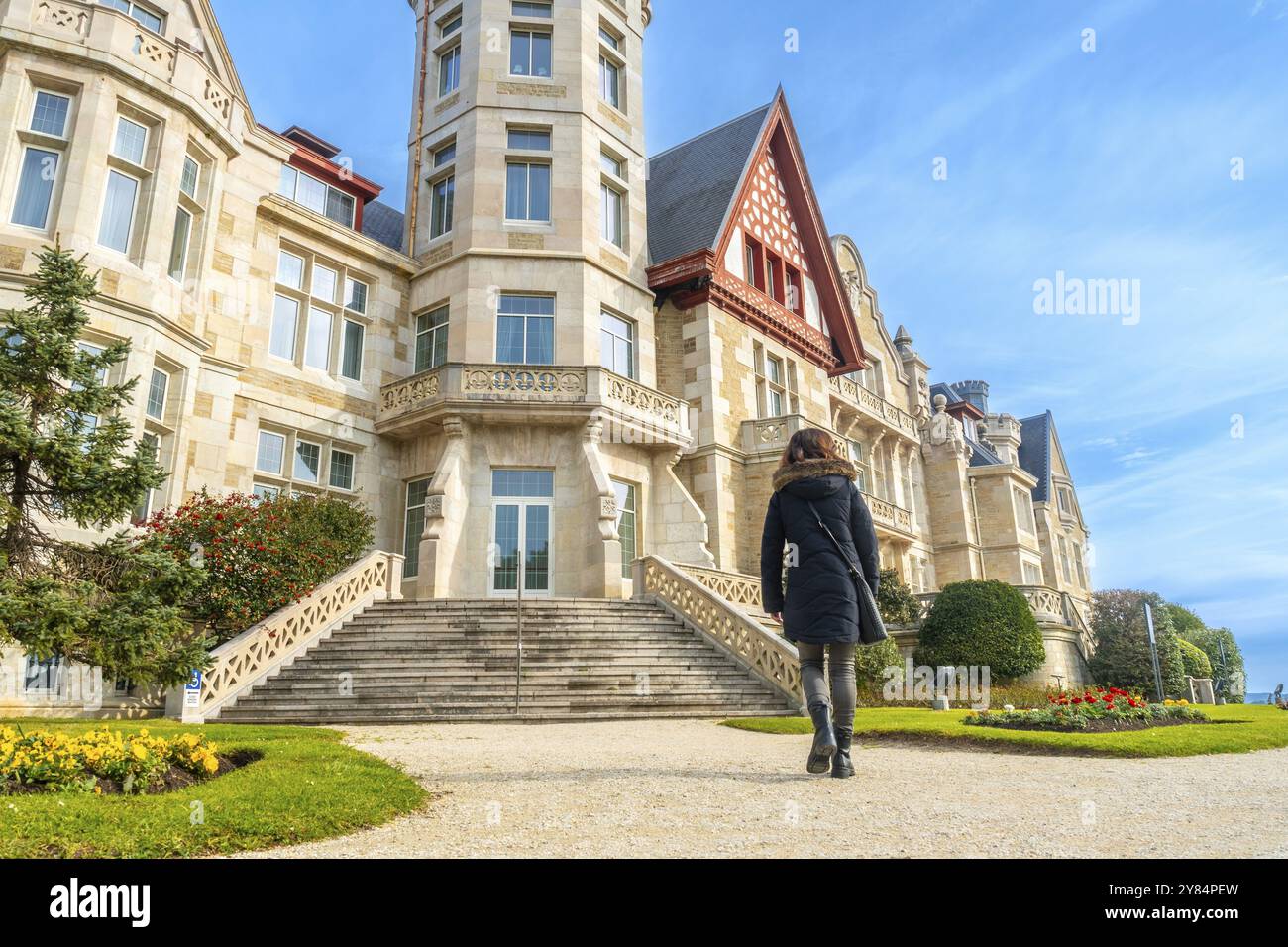 A tourist walking in the Magdalena Palace in the city of Santander ...