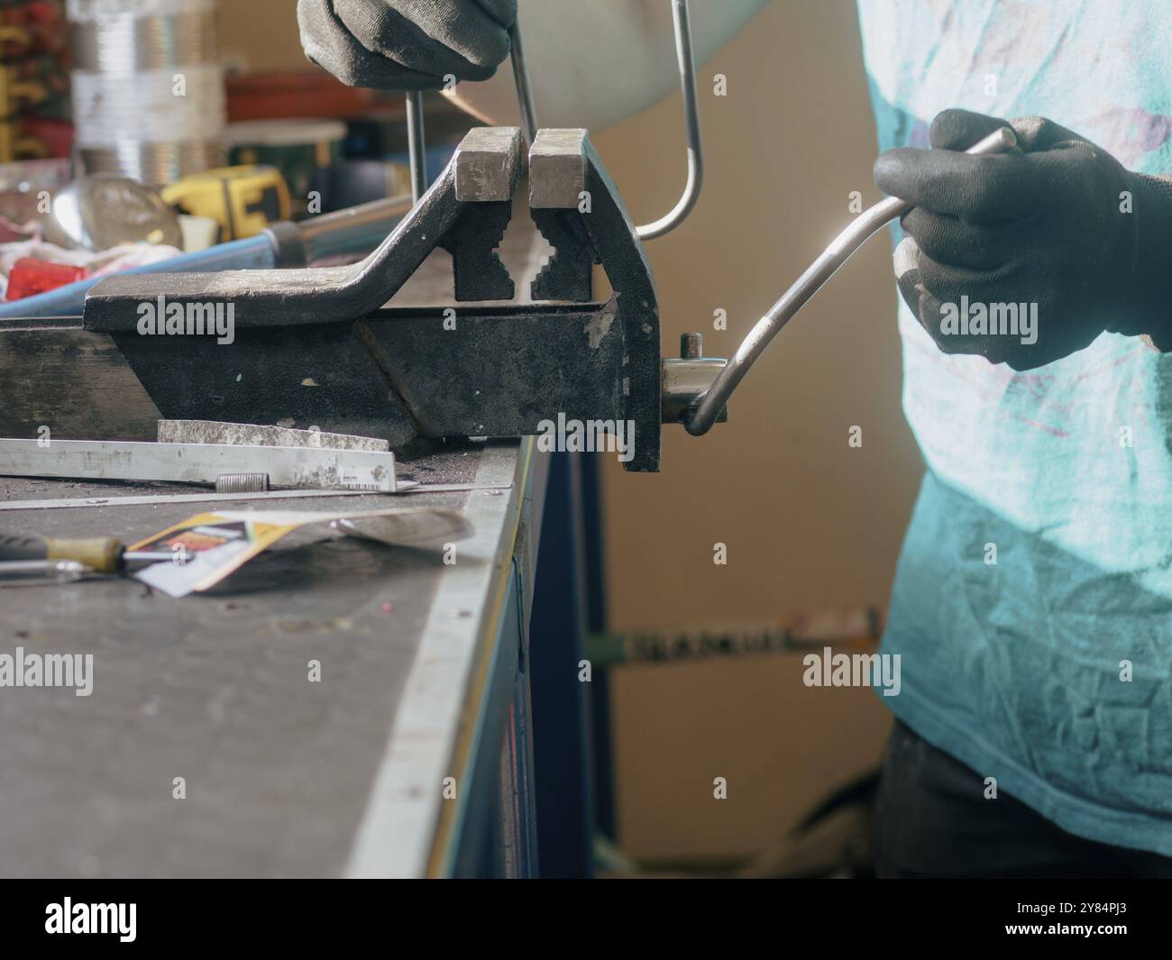 Bending metal rod hi-res stock photography and images - Alamy