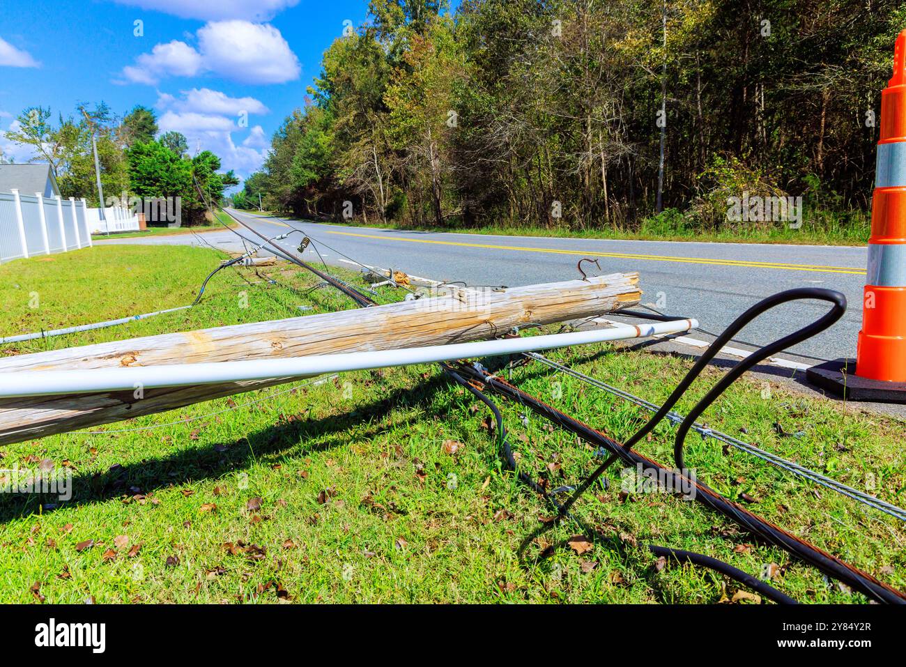 Strong hurricane winds caused electric poles to crash down with broken ...