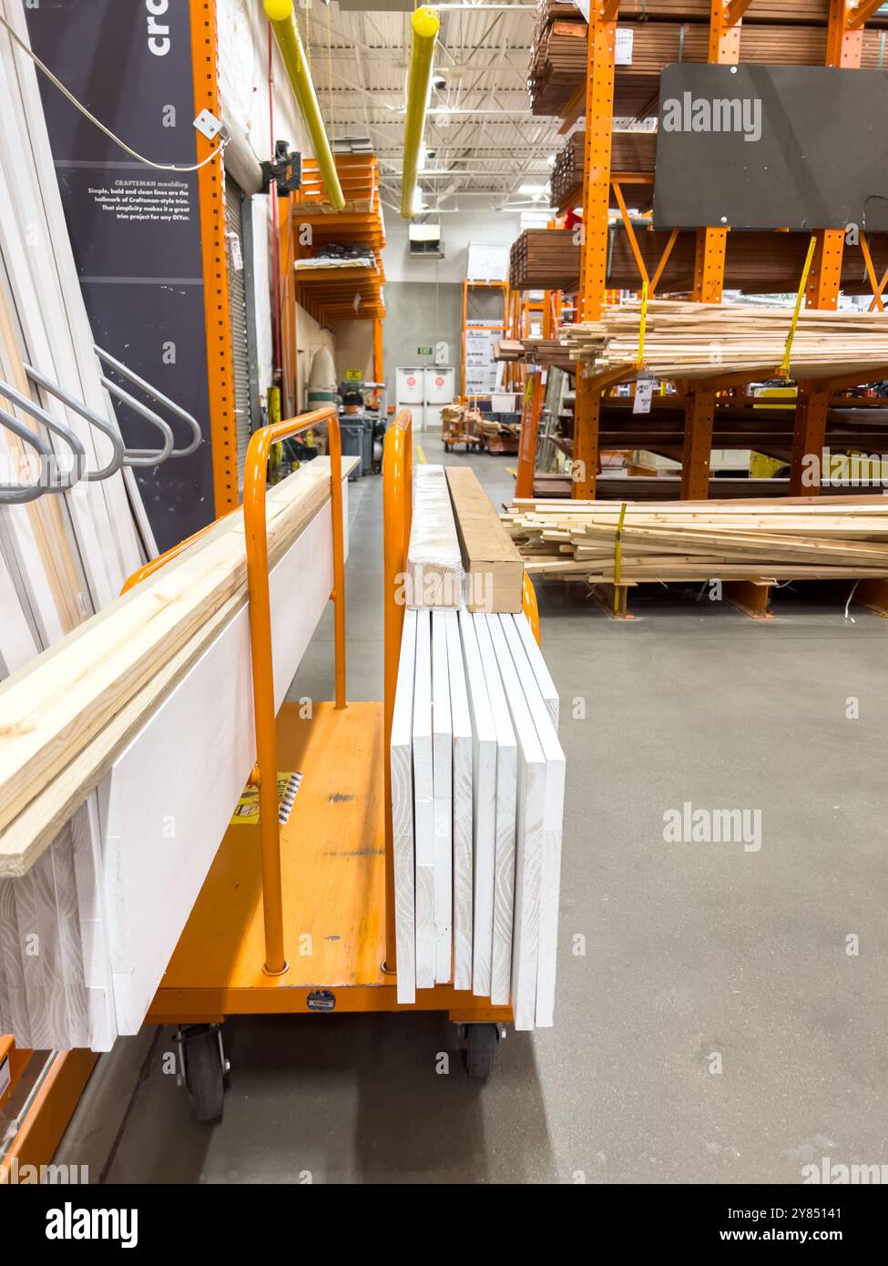 Lumber and Fencing Aisle in a Hardware Store with Wood Planks and ...