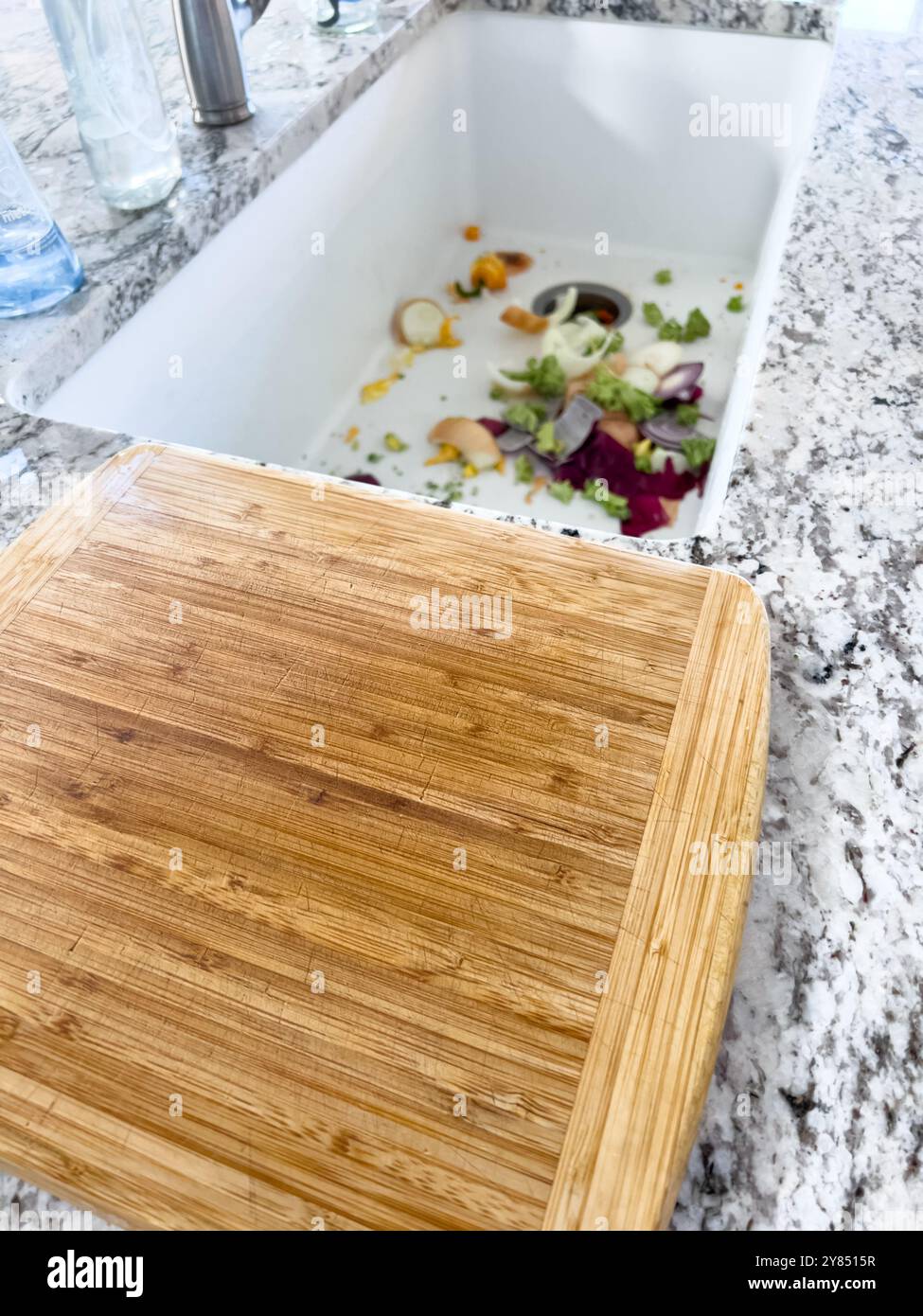 Vegetable Scraps in a Sink Ready for Disposal After Meal Preparation ...