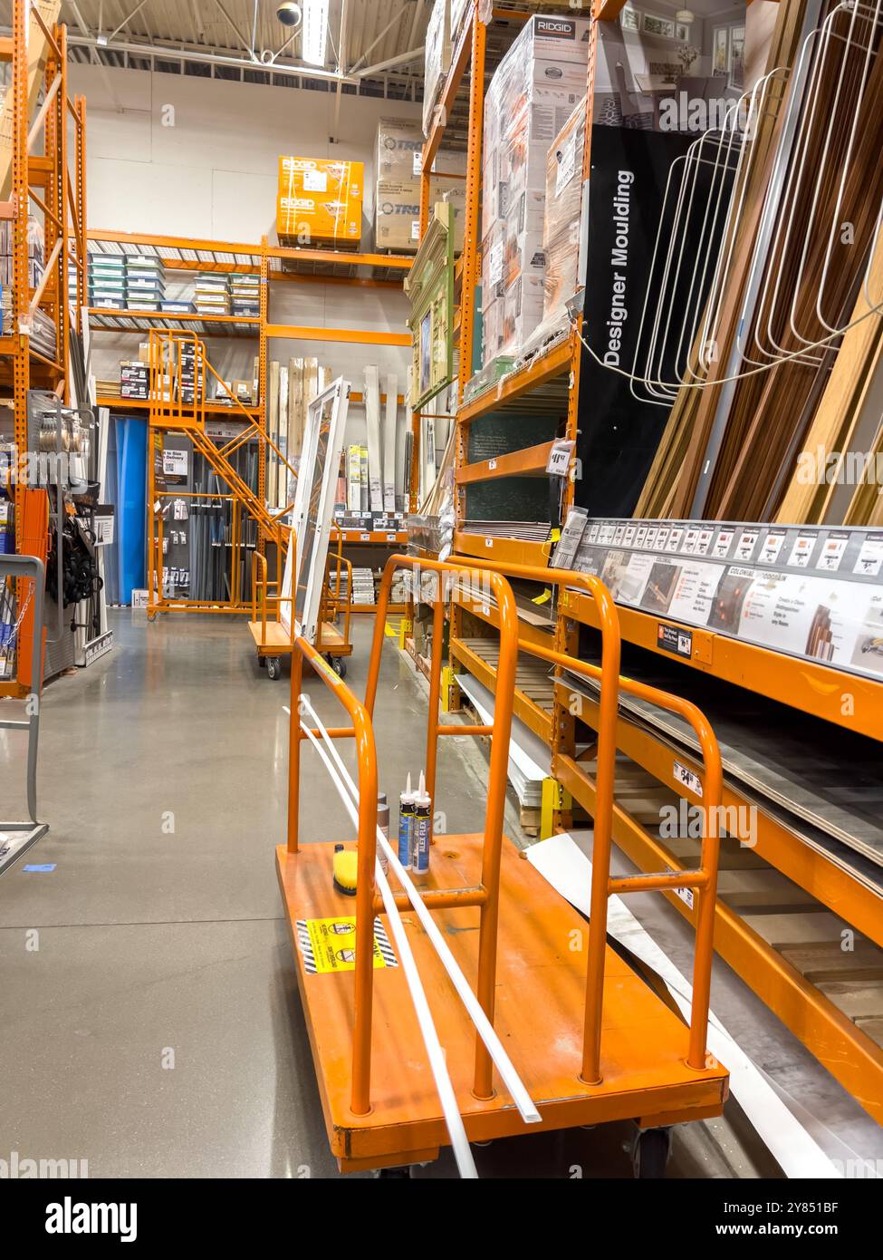 Lumber and Fencing Aisle in a Hardware Store with Wood Planks and ...