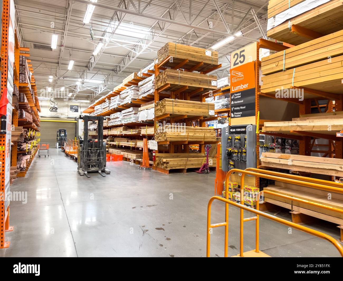 Lumber and Fencing Aisle in a Hardware Store with Wood Planks and ...