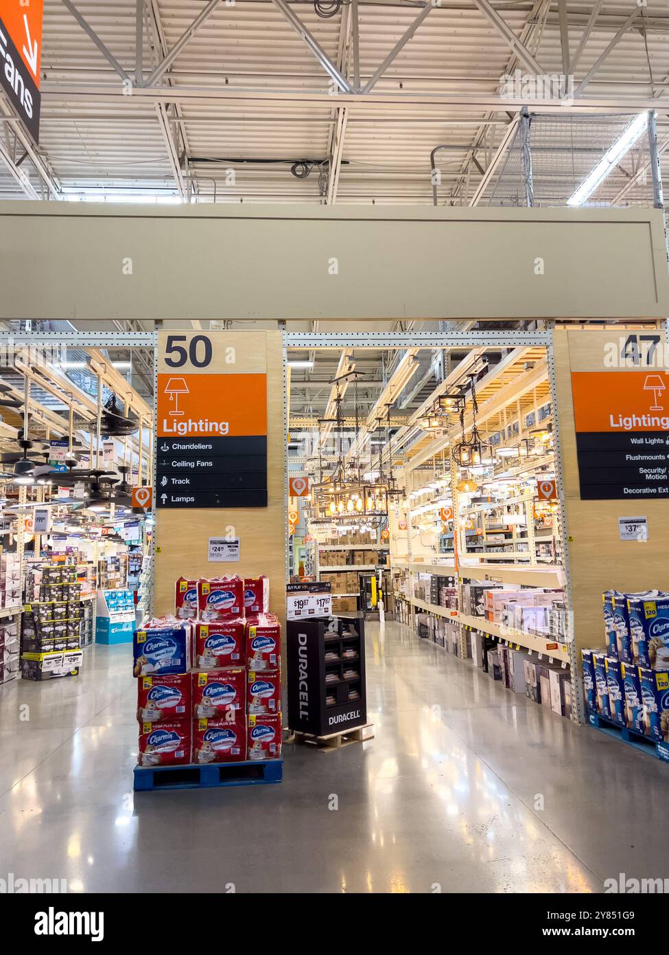 Lighting Section in a Hardware Store with Ceiling Fans and Lamps on ...