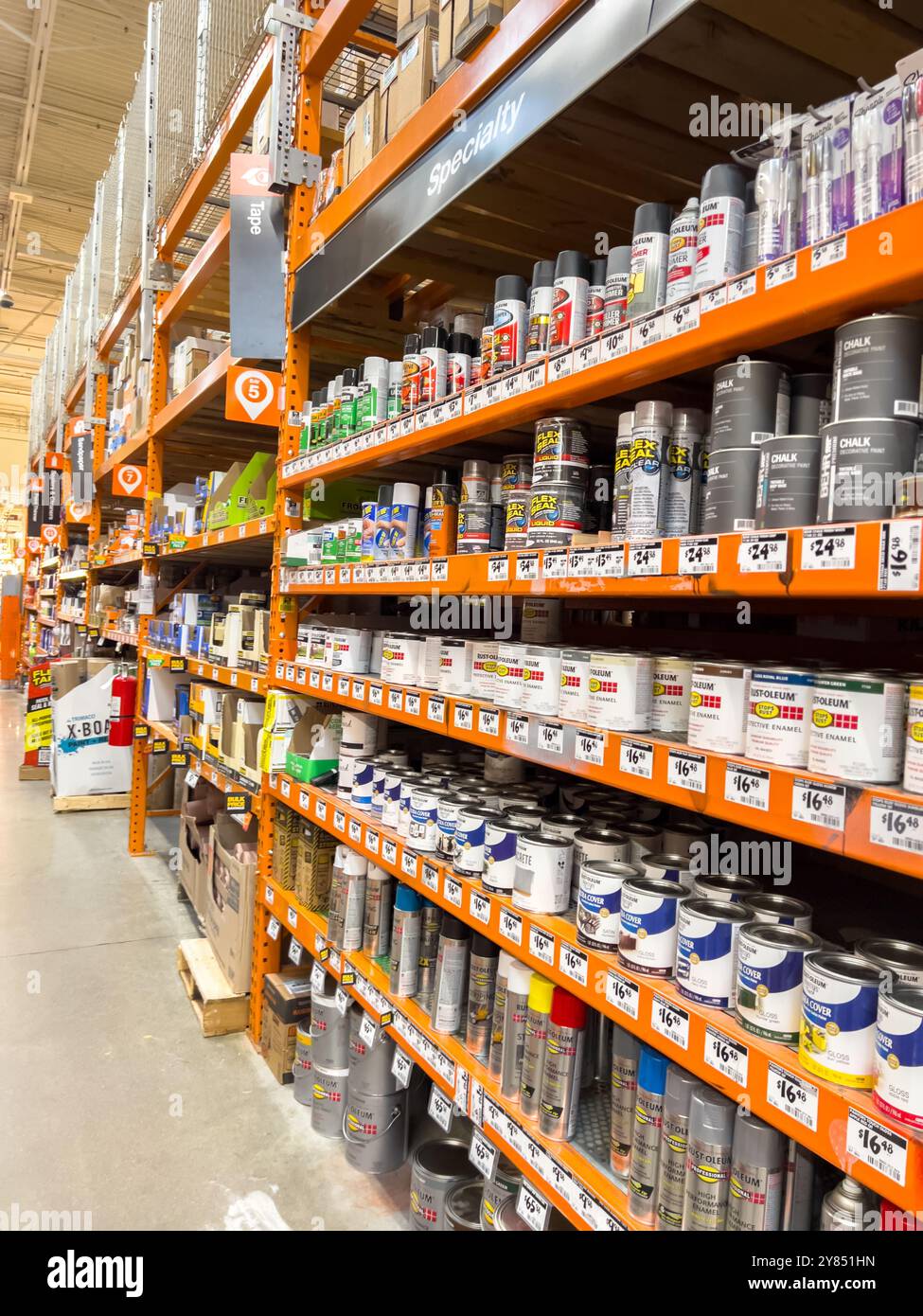 Aisle in Hardware Store Featuring Paint Supplies and Tools with Shelves ...
