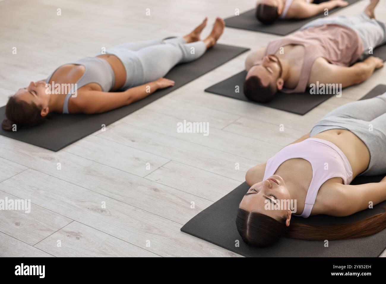 People lying on mats hi-res stock photography and images - Alamy