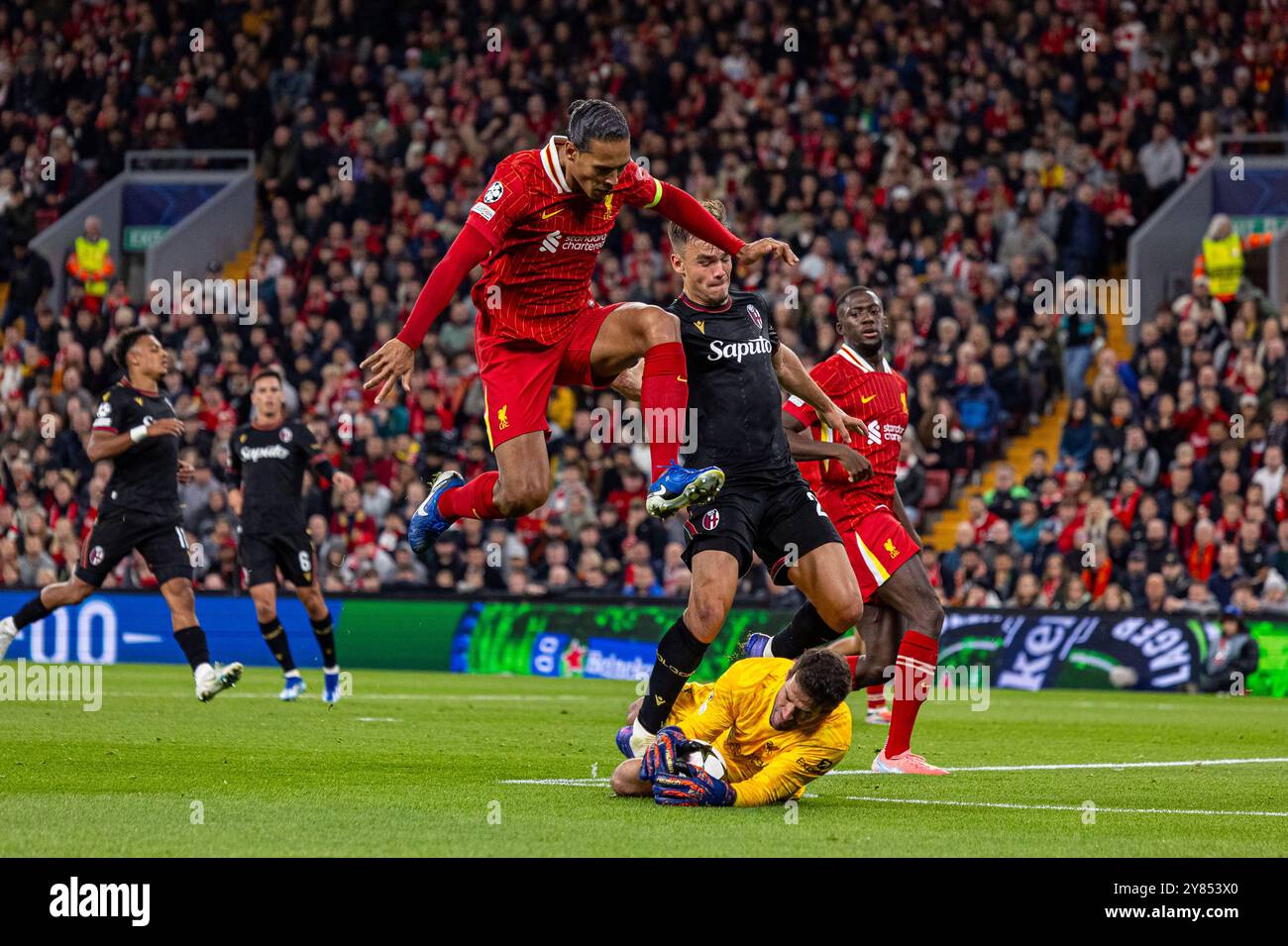 Liverpool. 3rd Oct, 2024. Liverpool's goalkeeper Alisson Becker (below ...