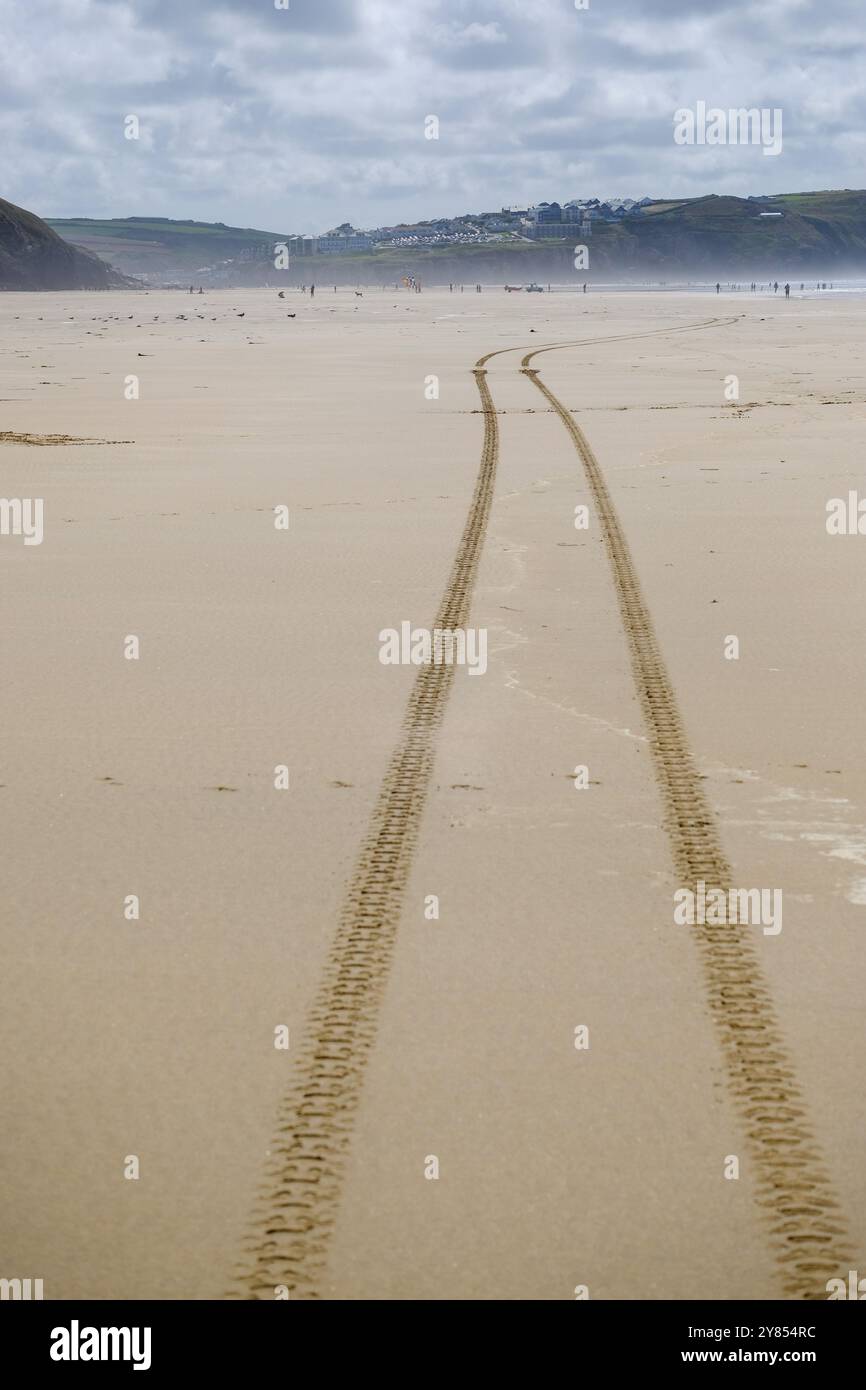 Vehicle tiyre tracks on a long beach in Perranporth, Cornwall, UK Stock ...