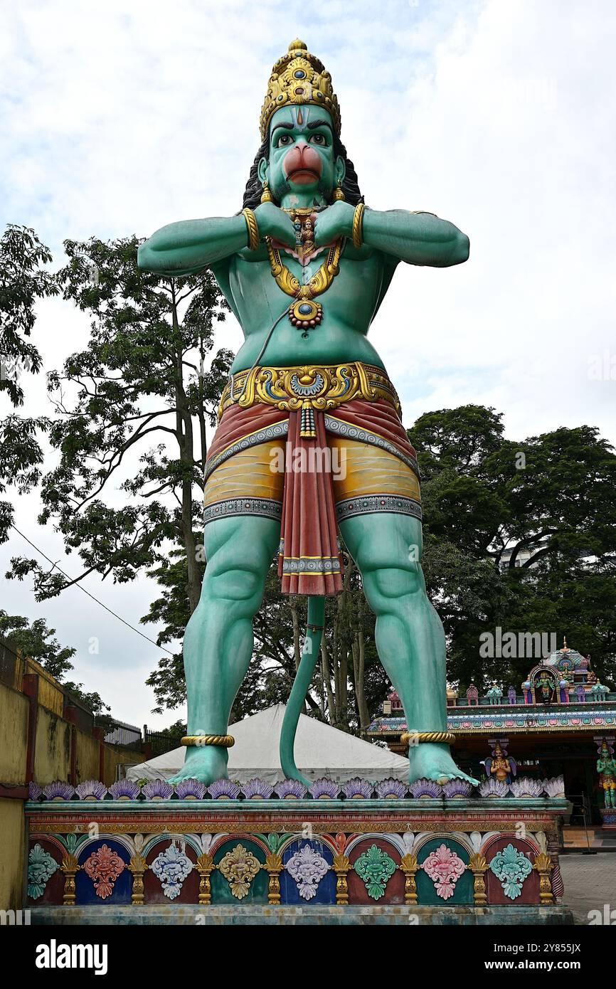 Giant statue of the popular Hindu deity Lord Hanuman, barring his chest ...