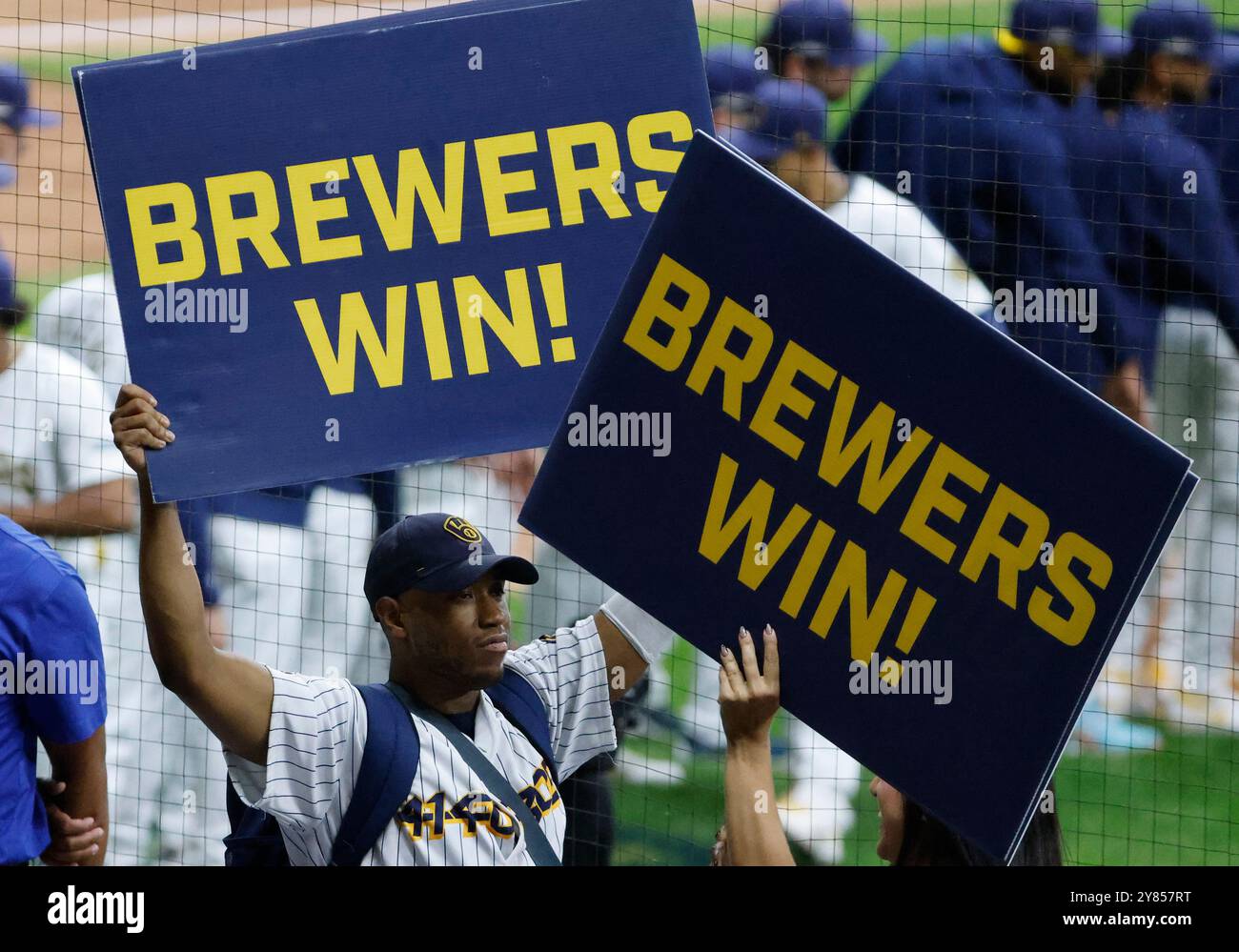Milwaukee, United States. 02nd Oct, 2024. Milwaukee Brewer fans hold ...
