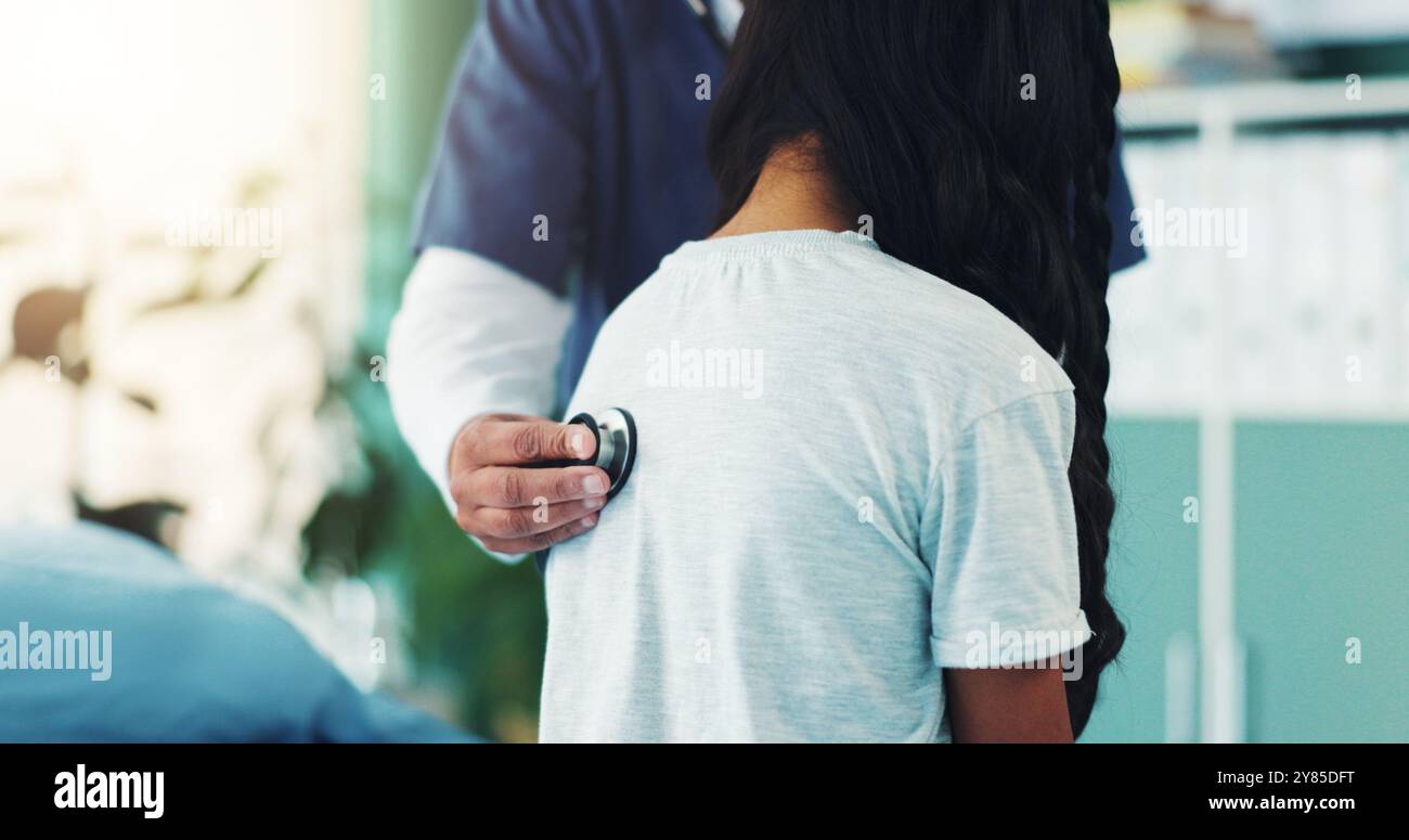 Doctor, child and lungs check with breathing, listening and medical ...