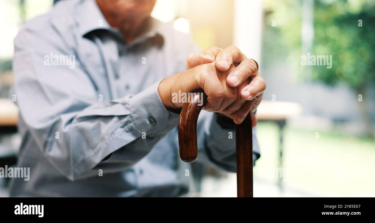 Outdoor, hands and senior person with walking stick for balance ...