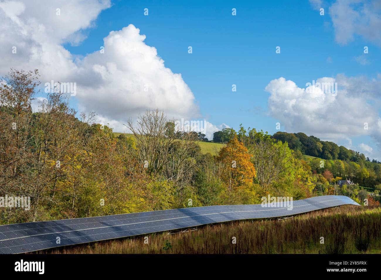 A view of solar panels in a rural landscape in the Scottish Borders ...