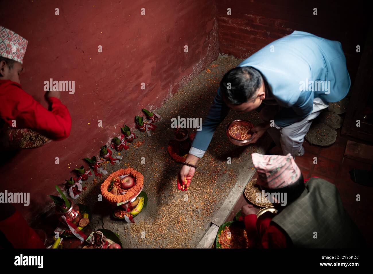 A priest along with nepalese army sows Jamara seeds to mark ...