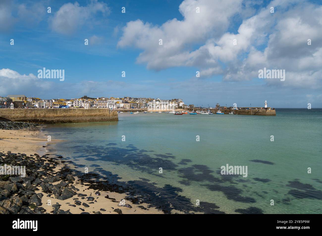 Pretty St. Ives harbour entrance in September as seen from the path ...