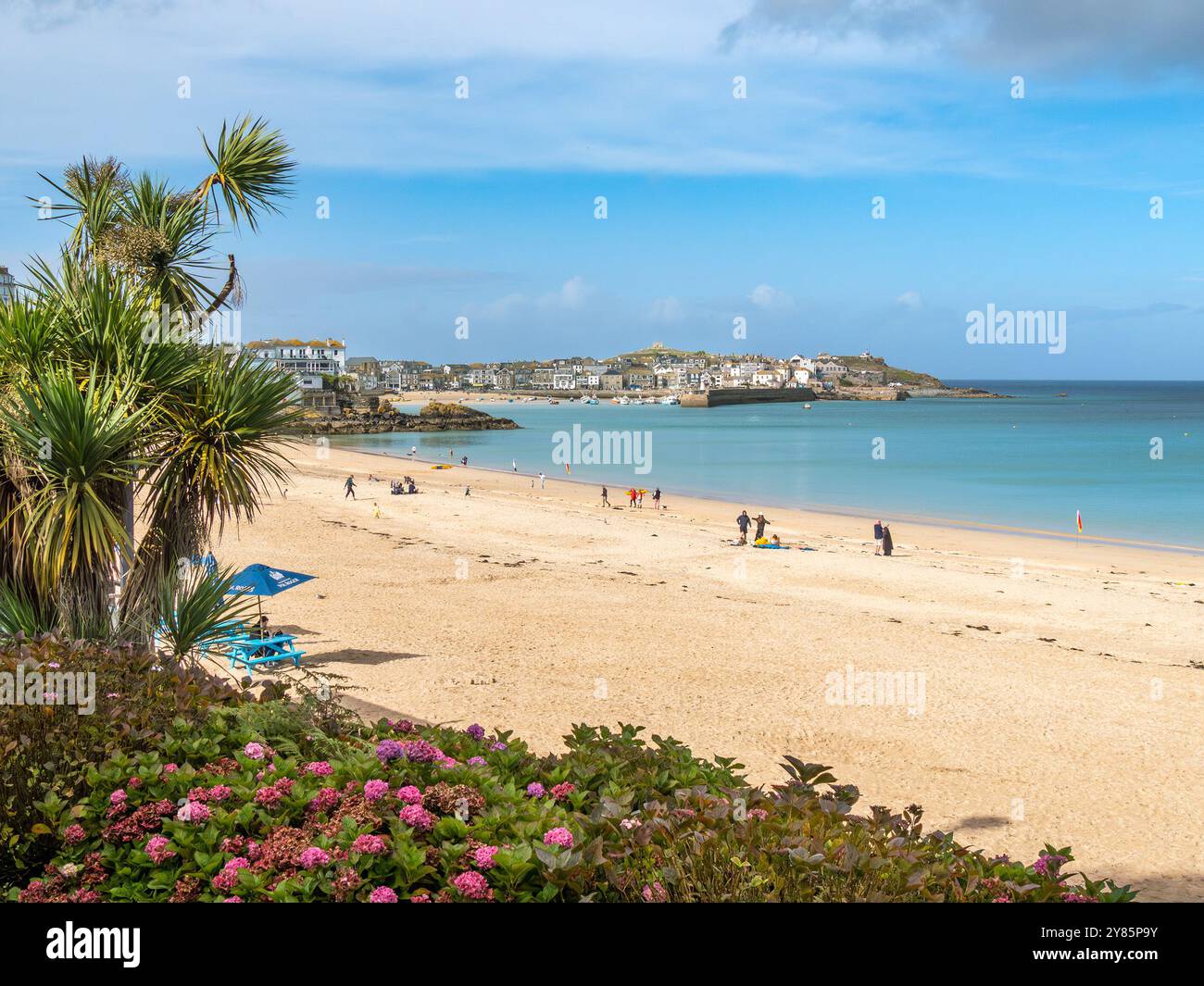 Beautiful Porthminster Beach with the seaside town of St. Ives in the ...