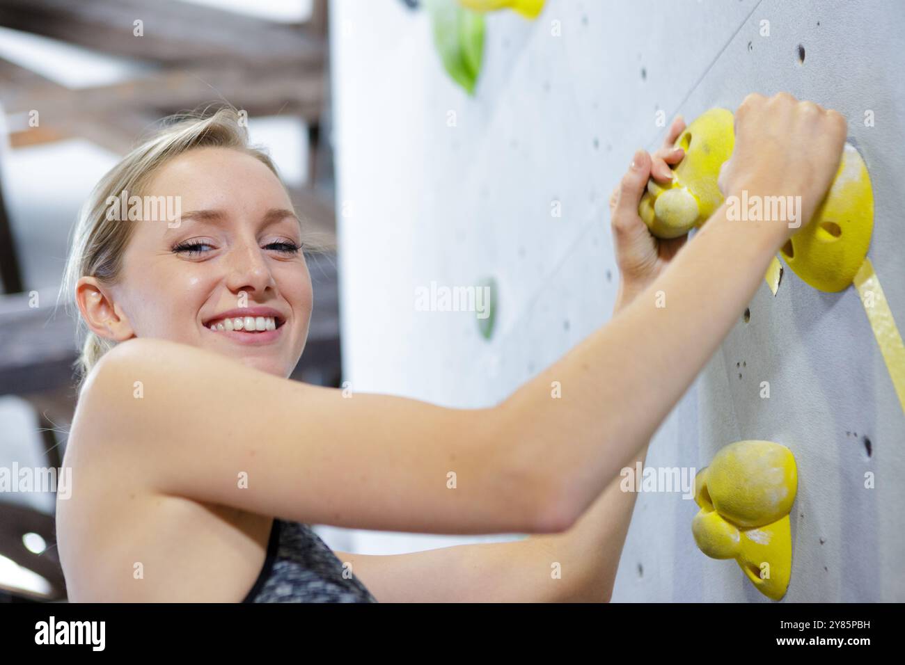 focused picture of female wall climber Stock Photo - Alamy