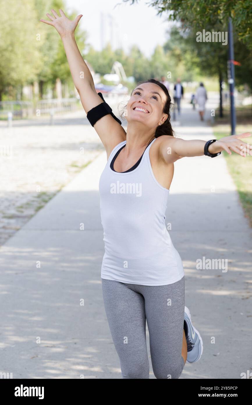 happy runner has finished her course Stock Photo - Alamy
