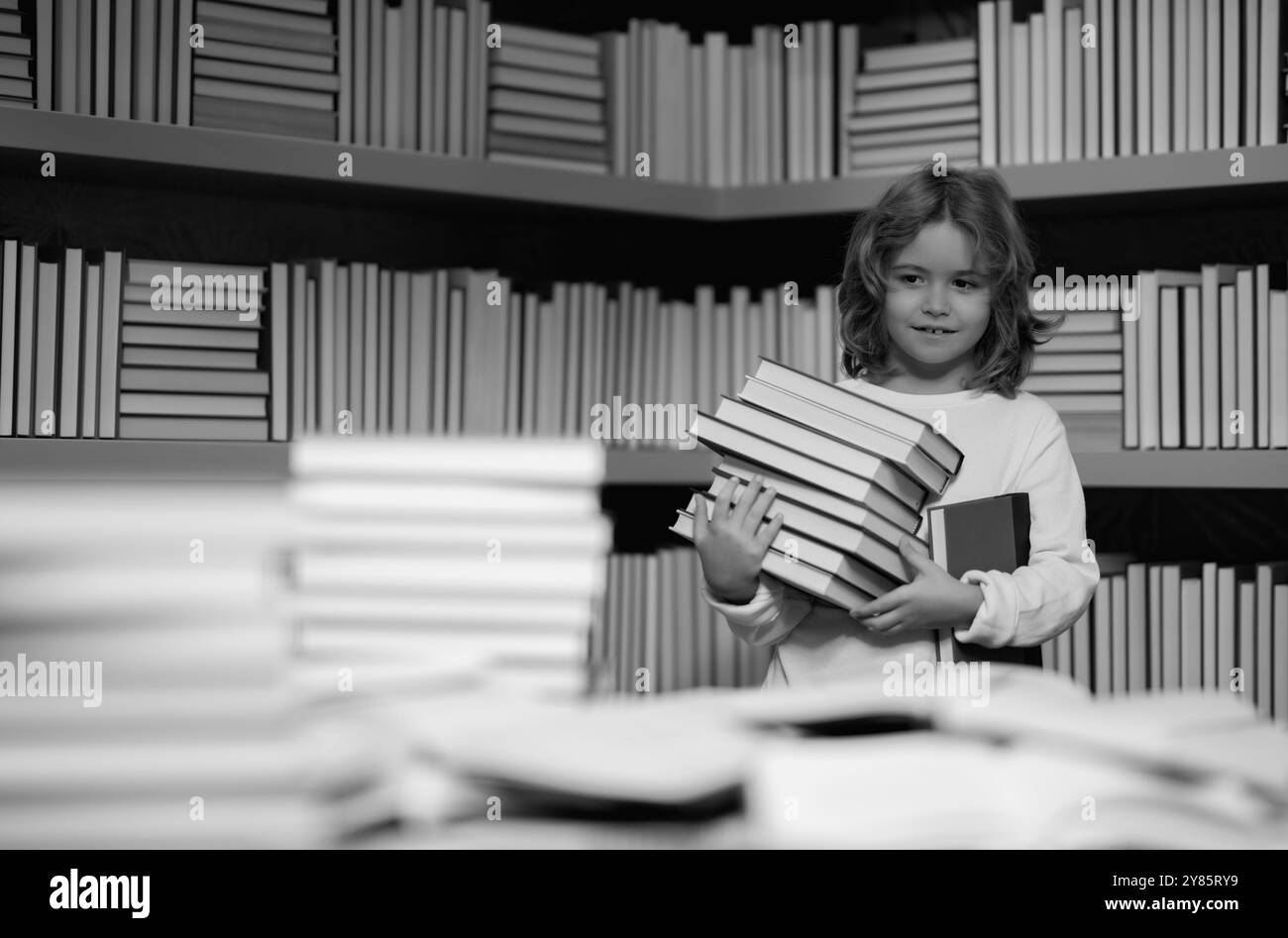 School kid hold stack of books. Smart pupil. School pupil with pile of ...