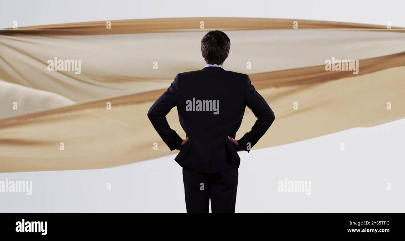 Image of caucasian businessman thinking over floating cloth on white ...