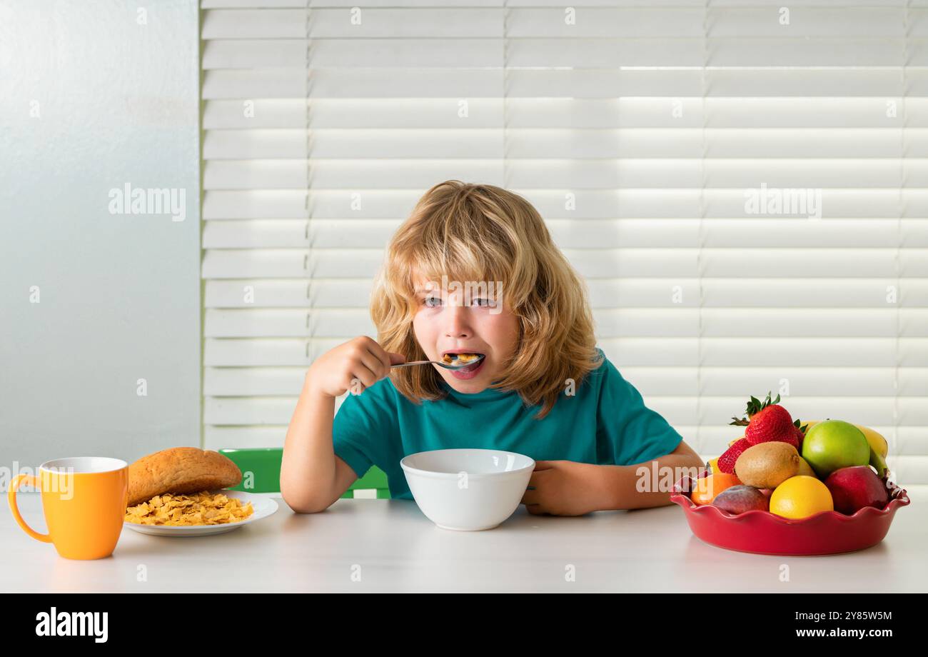 Child eats organic food. Healthy vegetables with vitamins. Proper kids ...