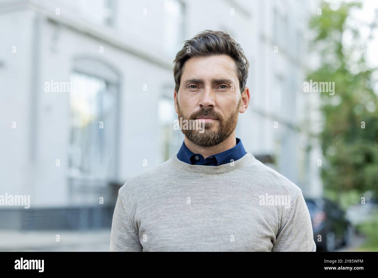 Person wearing blue sweater hi-res stock photography and images - Alamy