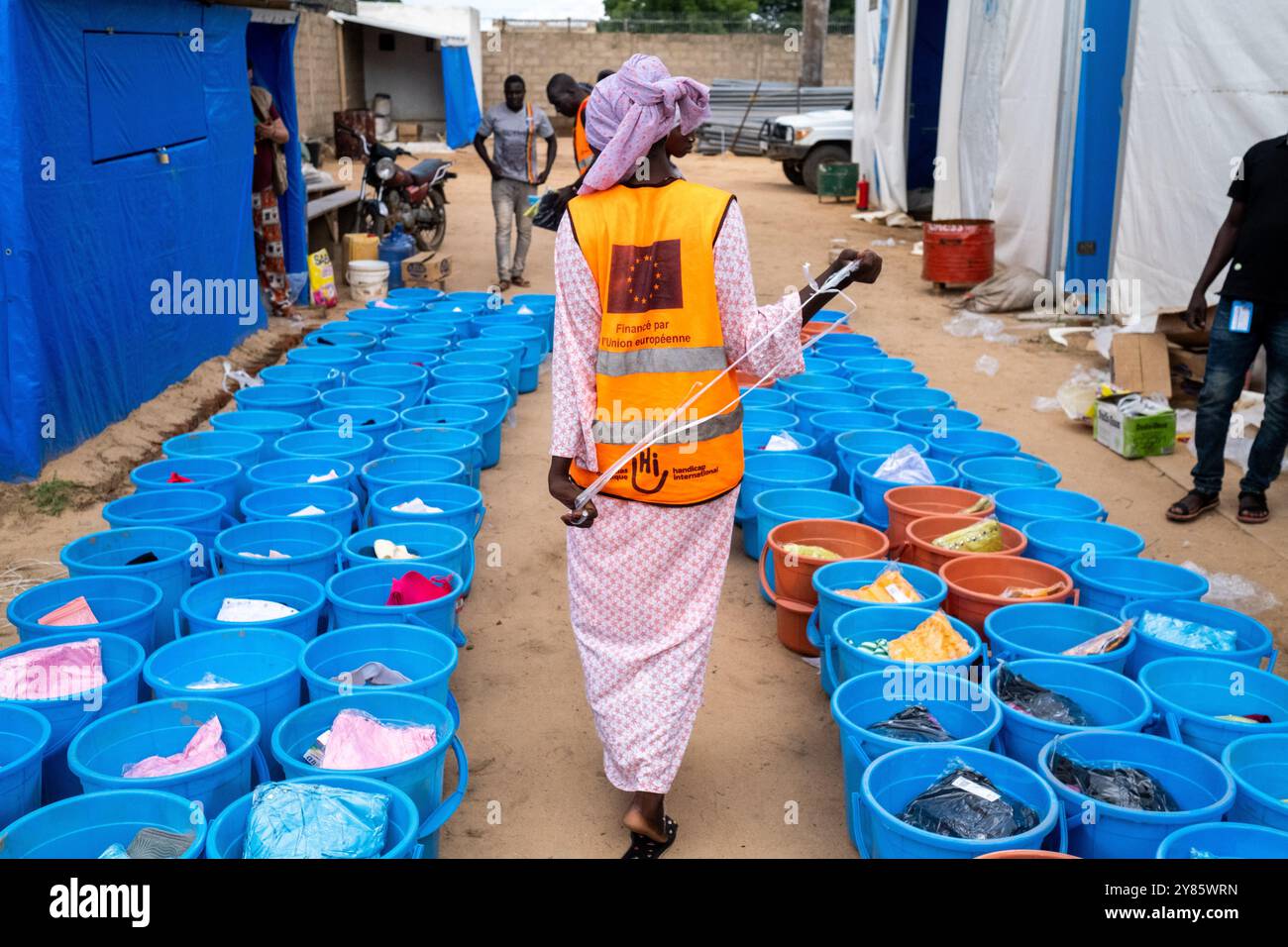 Woman daily worker preparing hygiene kits at the warehouse of Atlas ...