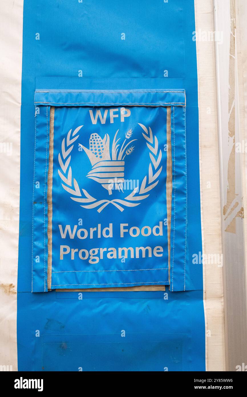Logo of the World Food Programme (WFP) on the tent of the warehouse of ...