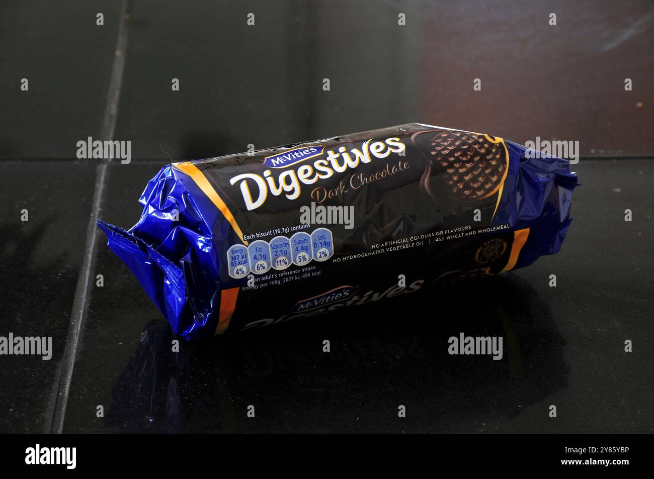 Opened packet of chocolate digestive biscuits Stock Photo - Alamy