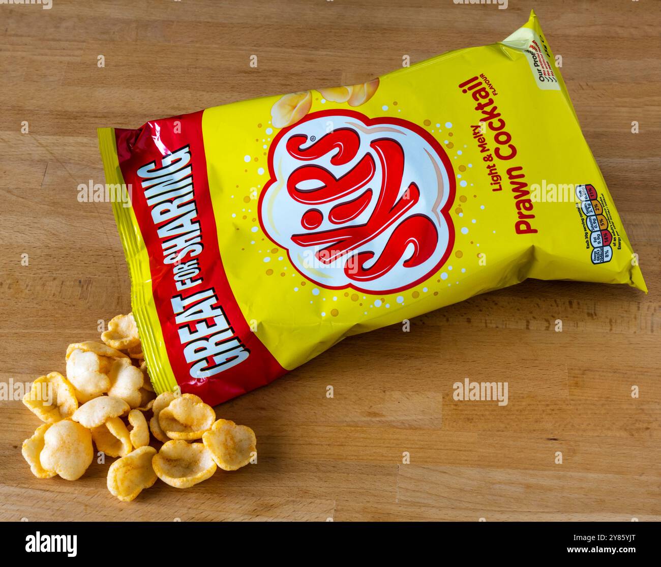 An open packet of prawn cocktail flavoured Skips Stock Photo - Alamy
