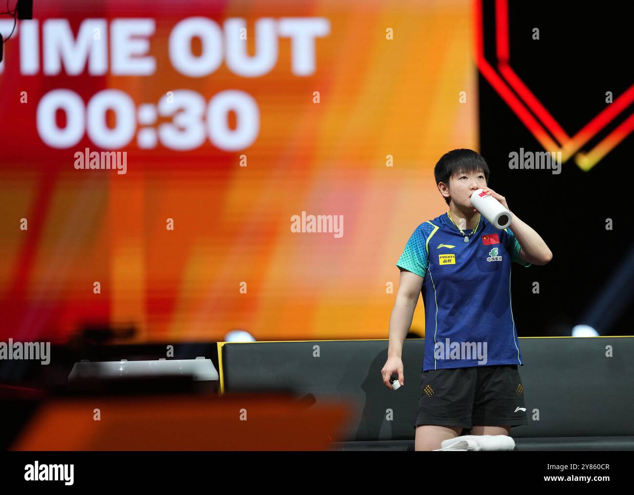 Beijing, China. 3rd Oct, 2024. Sun Yingsha of China drinks water at break time while competing ...