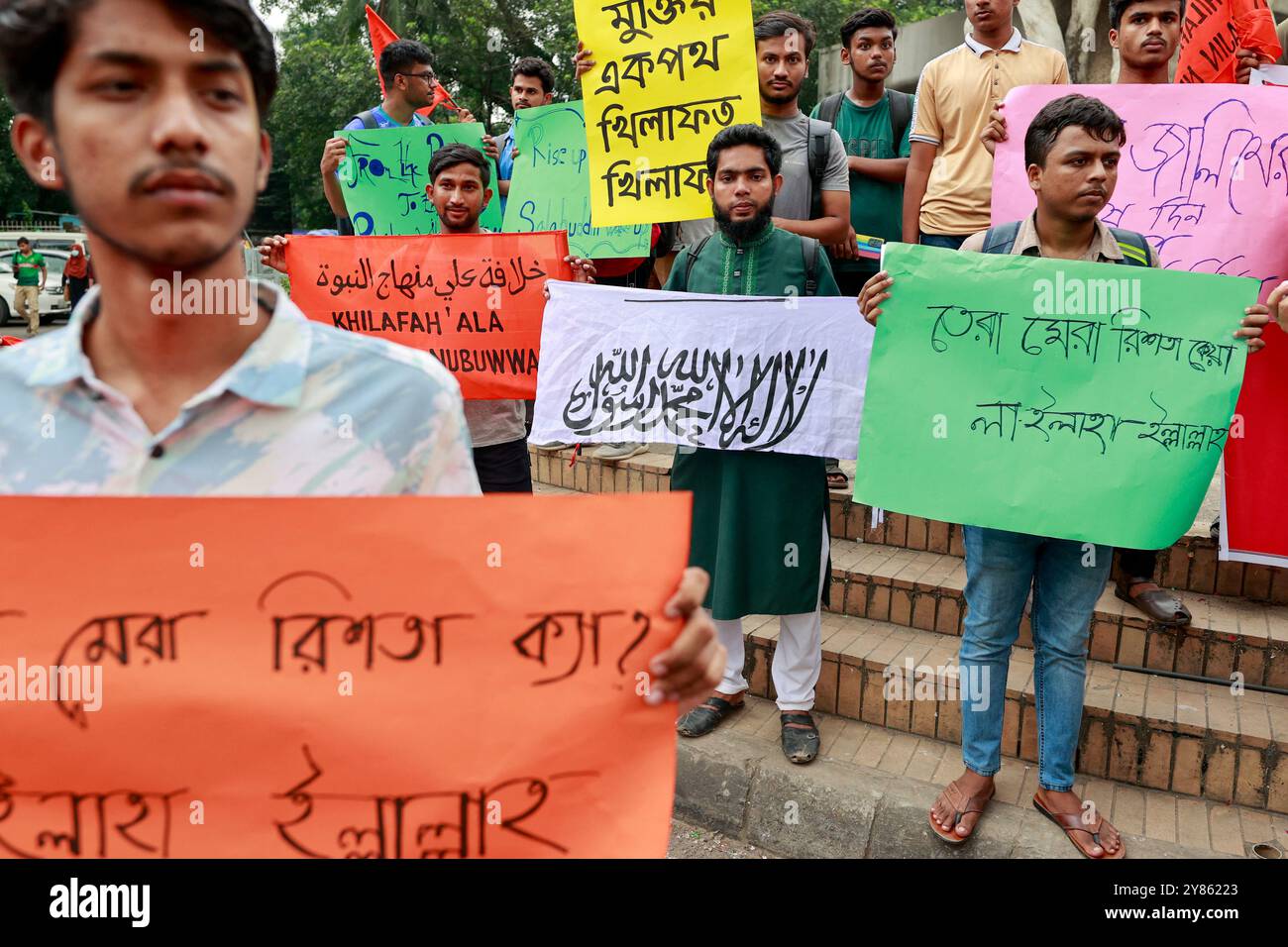 Students of Dhaka University gather in a protest against the insults of ...