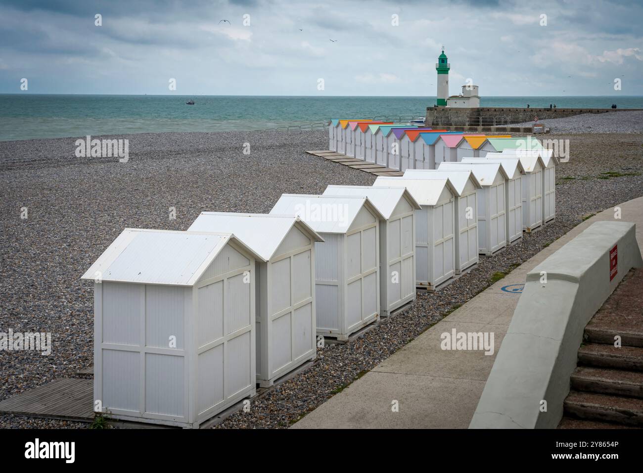 Le Treport, France - 09 16 2024: View of white beach cabins with ...