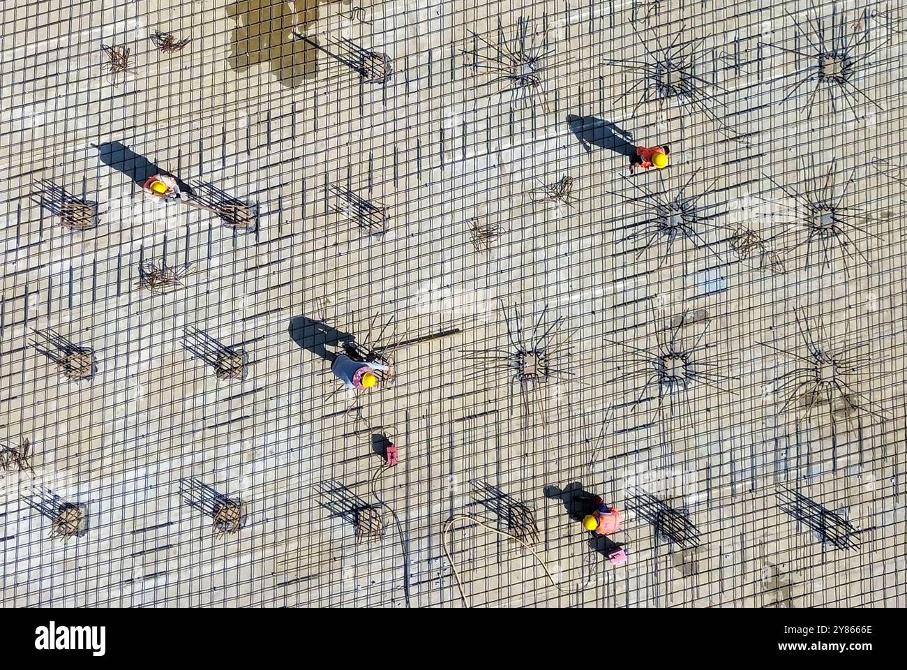 WUXI, CHINA - OCTOBER 3, 2024 - An aerial photo shows steel workers at ...