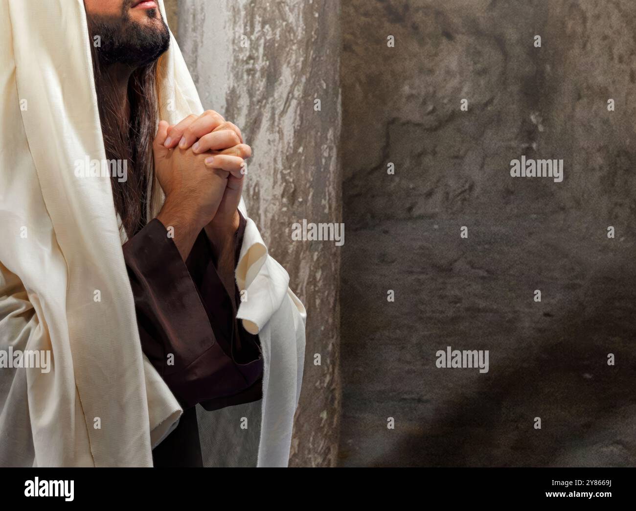 Prophet praying deeply in an ancient building, eyes closed, seeking ...