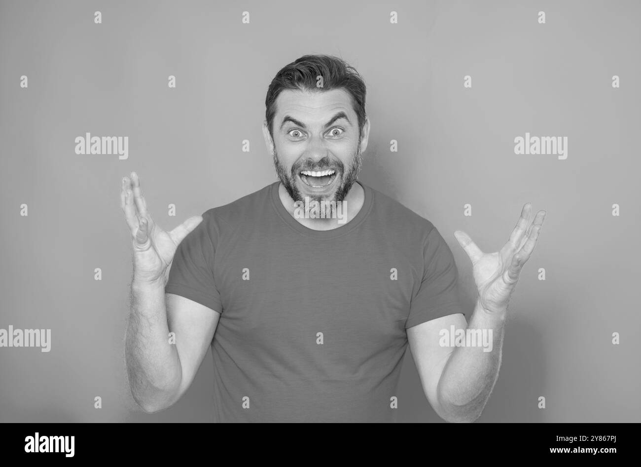 Enthusiastic happy surprised man Black and White Stock Photos & Images ...