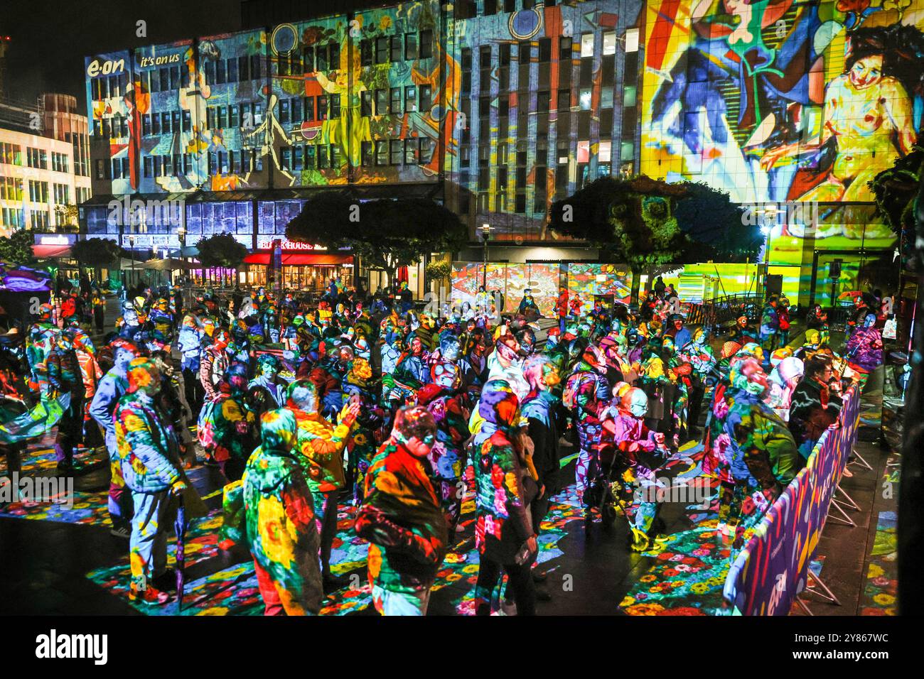 Essen, NRW, Germany, 02nd Oct 2024. Visitors interact with collaged ...