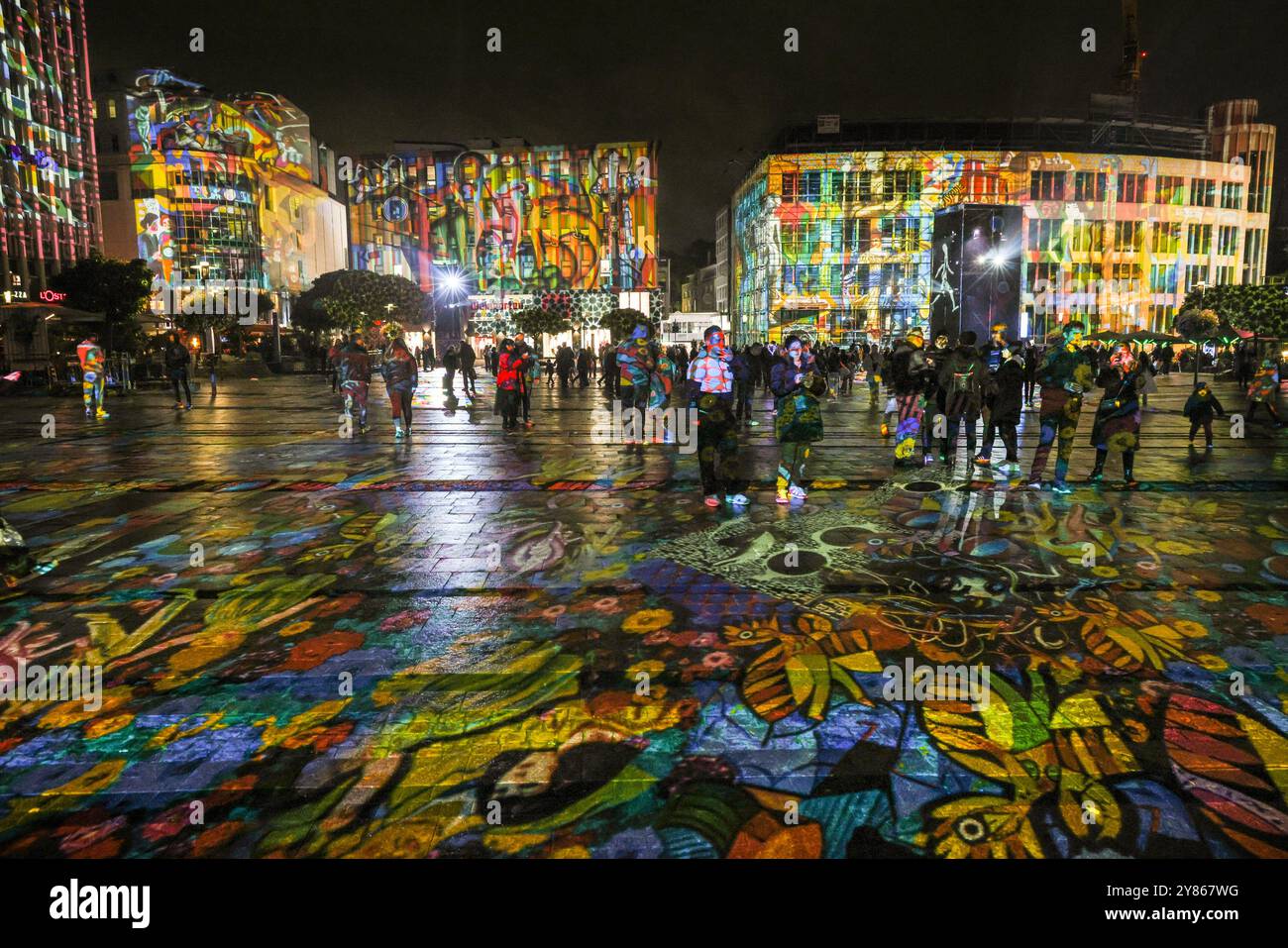 Essen, NRW, Germany, 02nd Oct 2024. Visitors interact with collaged ...