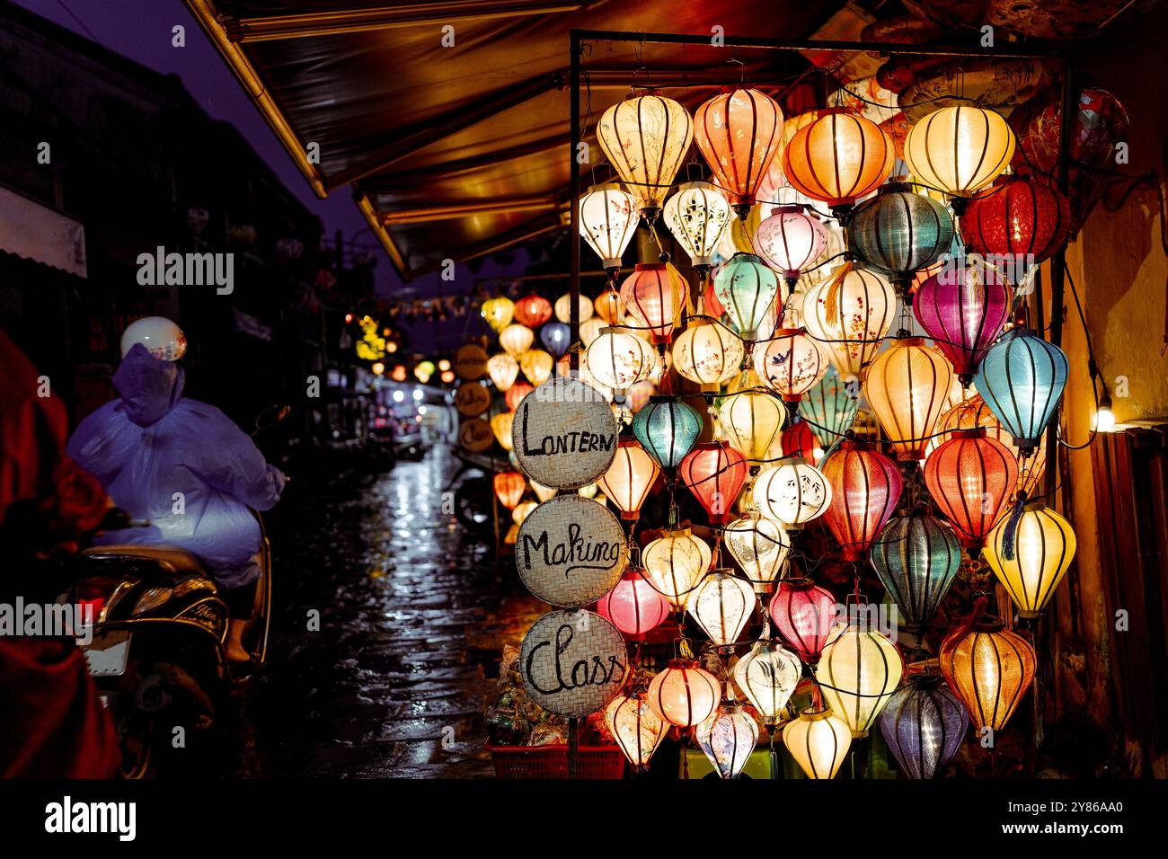 Traditional lantern shop at night in Hoi An old town. Close up of ...